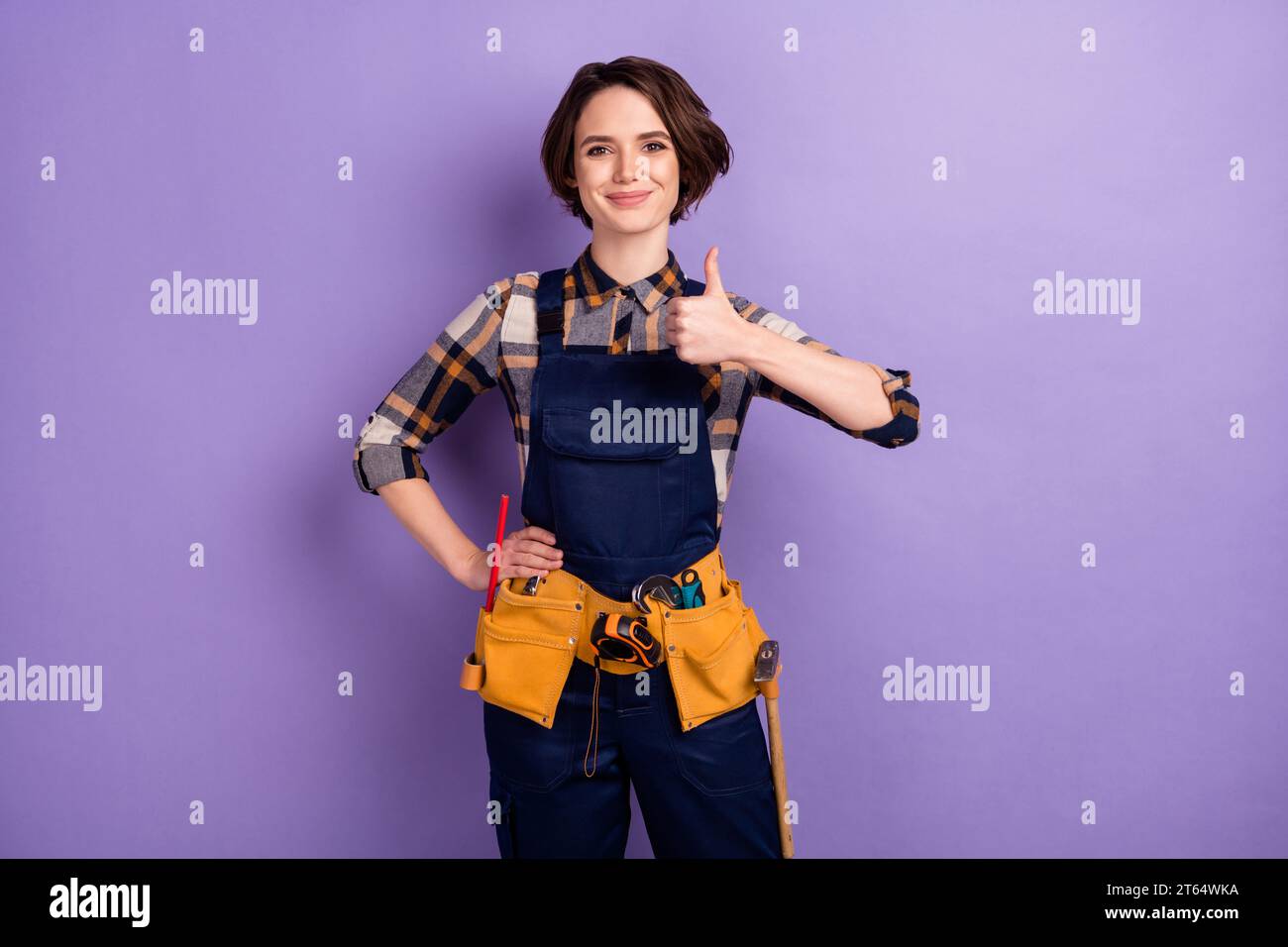 Photo of young attractive woman happy positive smile builder show thumb ...