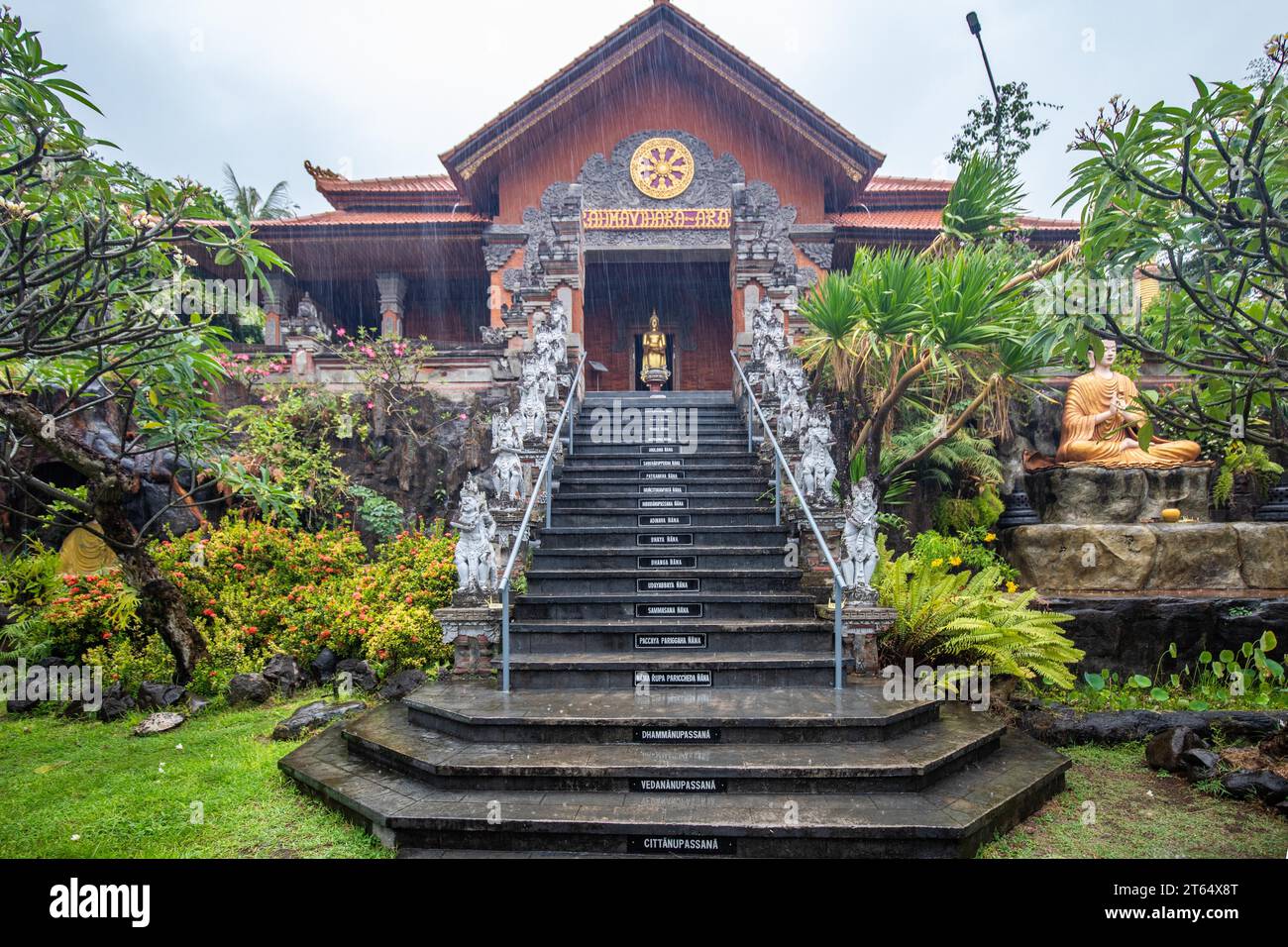 A Buddhist temple in the evening in the rain. The Brahmavihara Arama Temple has beautiful ...