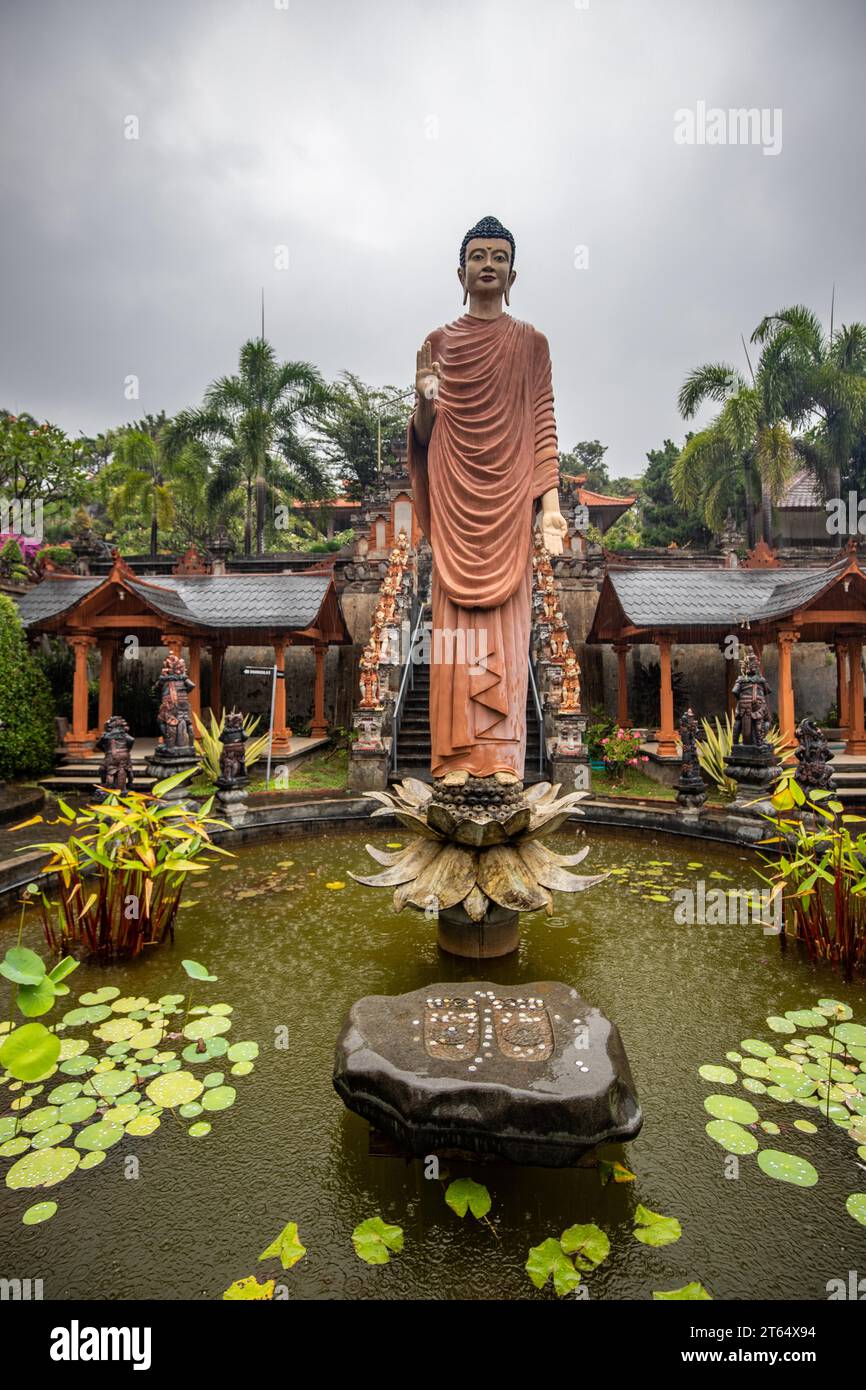 A Buddhist temple in the evening in the rain. The Brahmavihara Arama ...