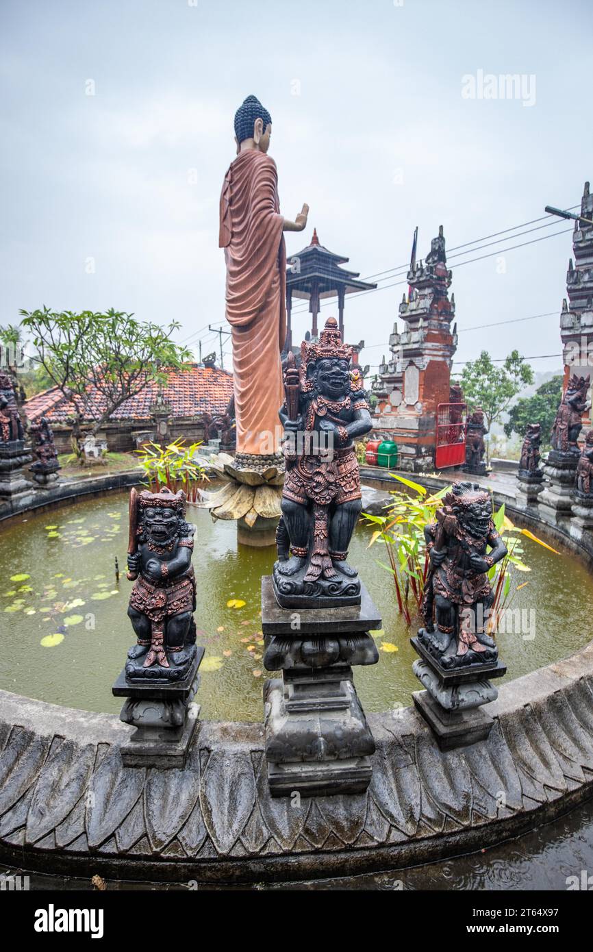 A Buddhist temple in the evening in the rain. The Brahmavihara Arama ...