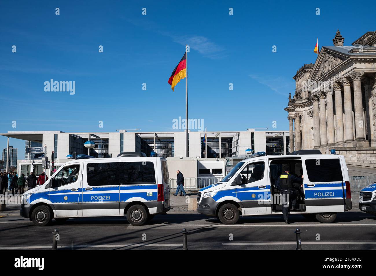 16.03.2023, Berlin, Germany, Europe - Police cars are seen parked next ...