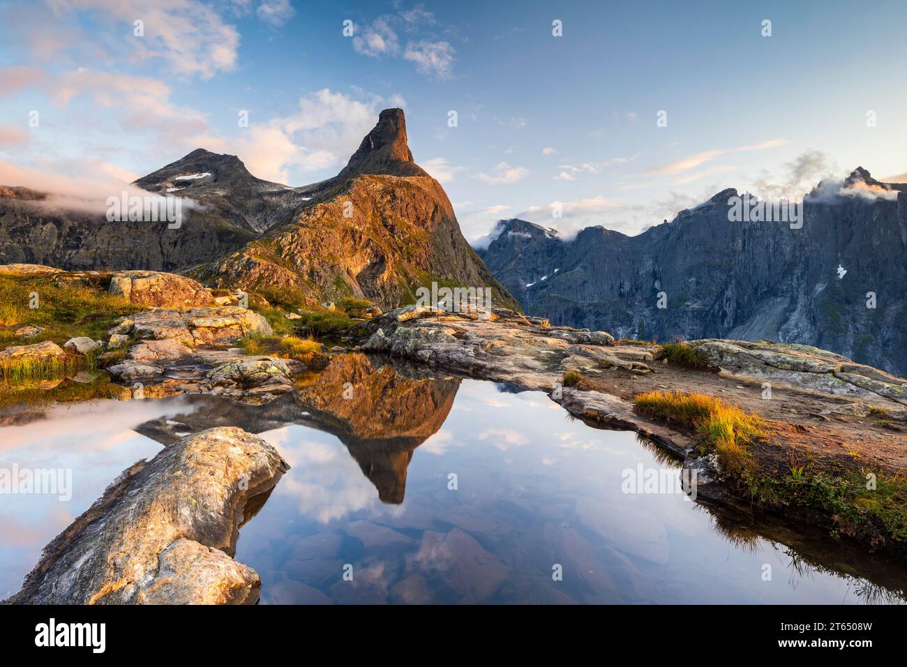 Romsdalshornet mountain reflected in mountain lake, Andalsnes, More og ...