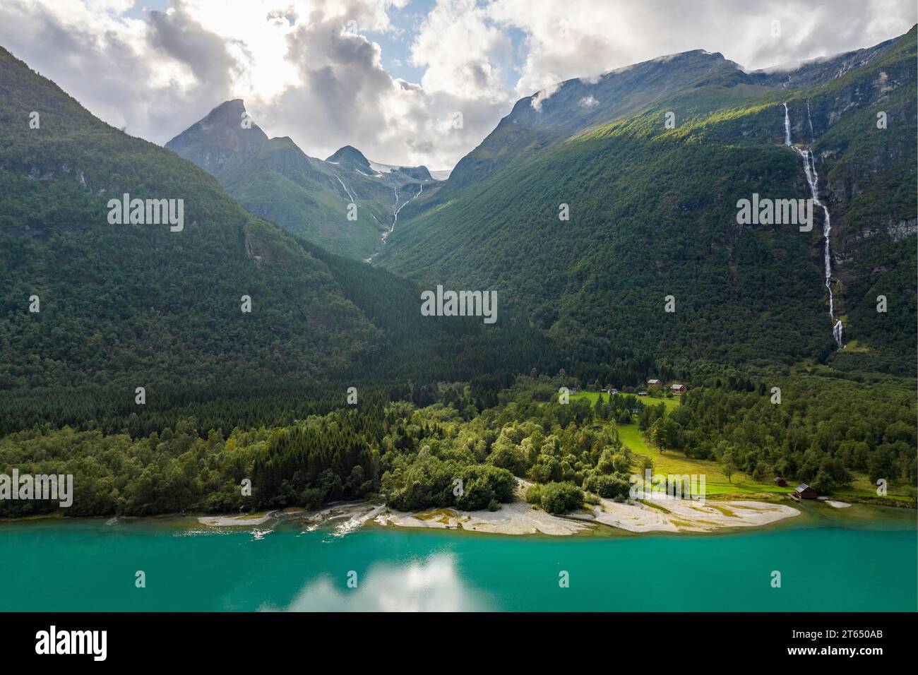 Lake Lovatnet, turquoise lake with mountain flanks and waterfalls, Loen ...
