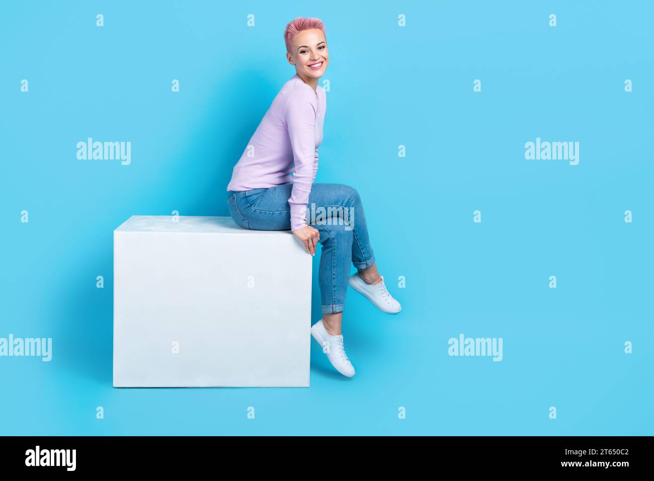 Full body profile cadre of young model funky cheerful girl sitting ...