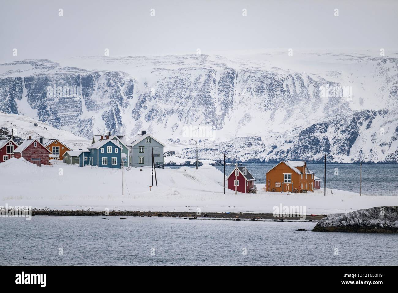 Colourful houses in a snowy landscape, fishing village Kongsfjord ...