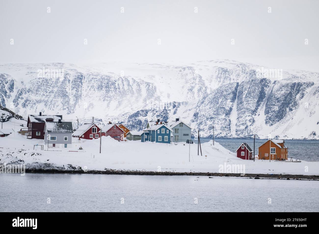 Colourful houses in a snowy landscape, fishing village Kongsfjord ...