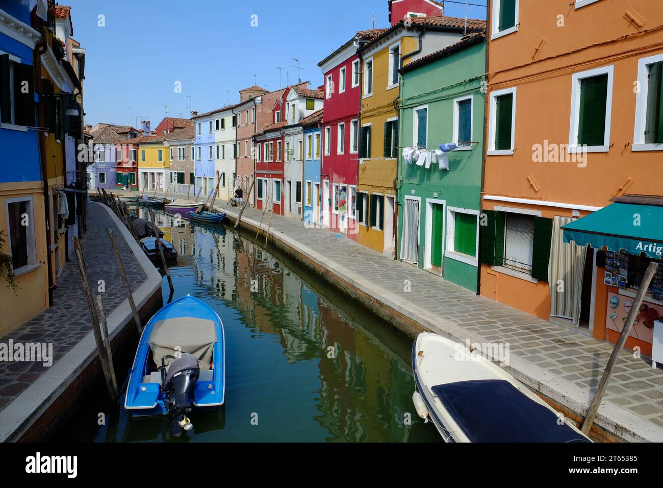 Vibrant Colors of Burano: Charming canalside view with the iconic ...