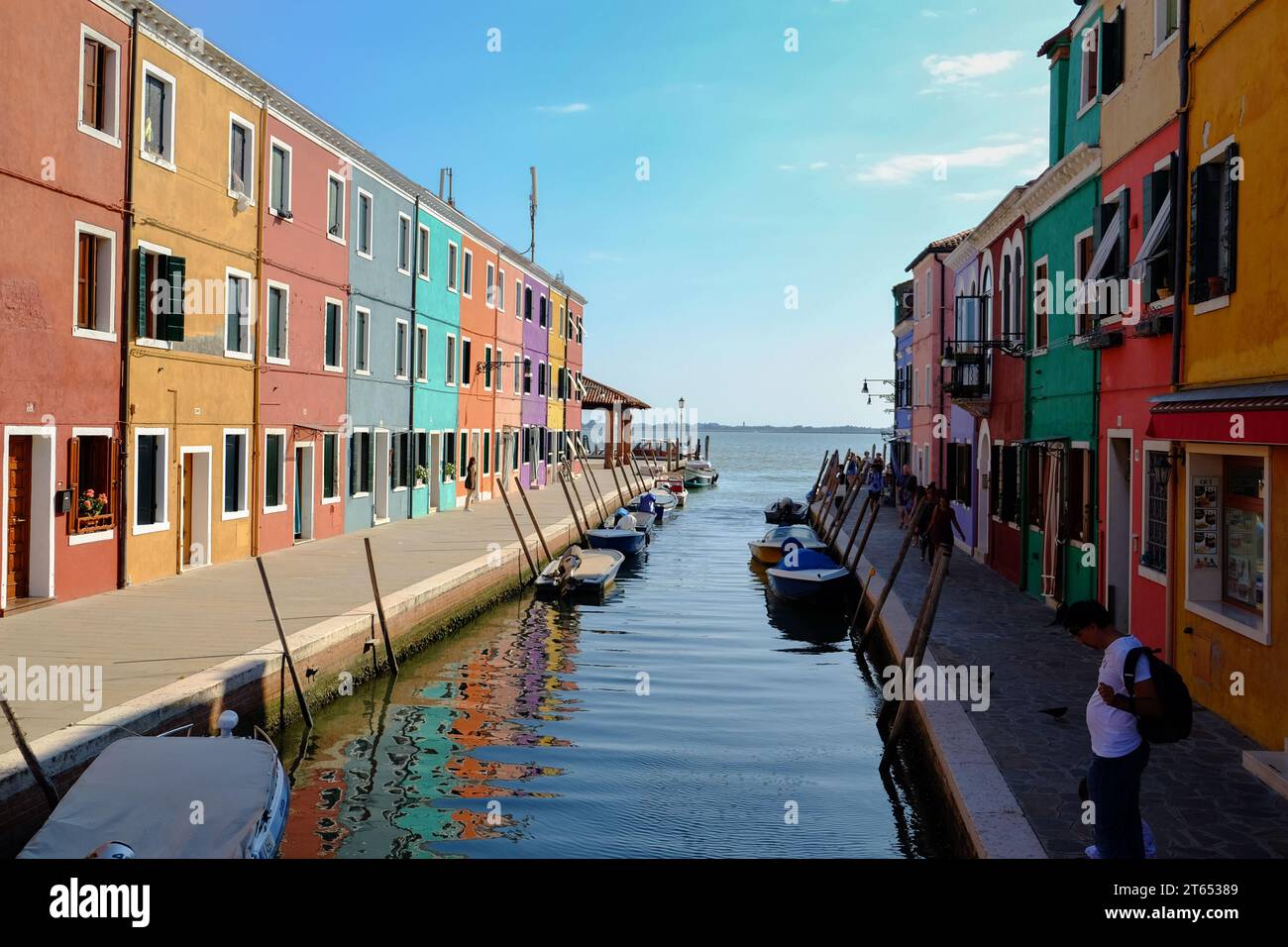 Vibrant Colors of Burano: Charming canalside view with the iconic ...