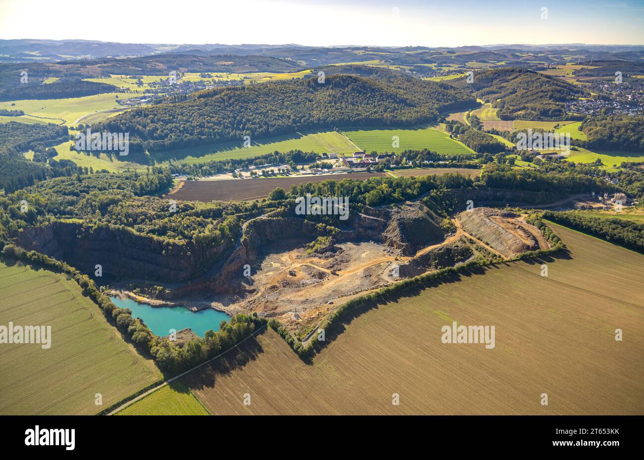 Aerial view, Beckum open-cast quarry and Wocklum Castle with wooded ...