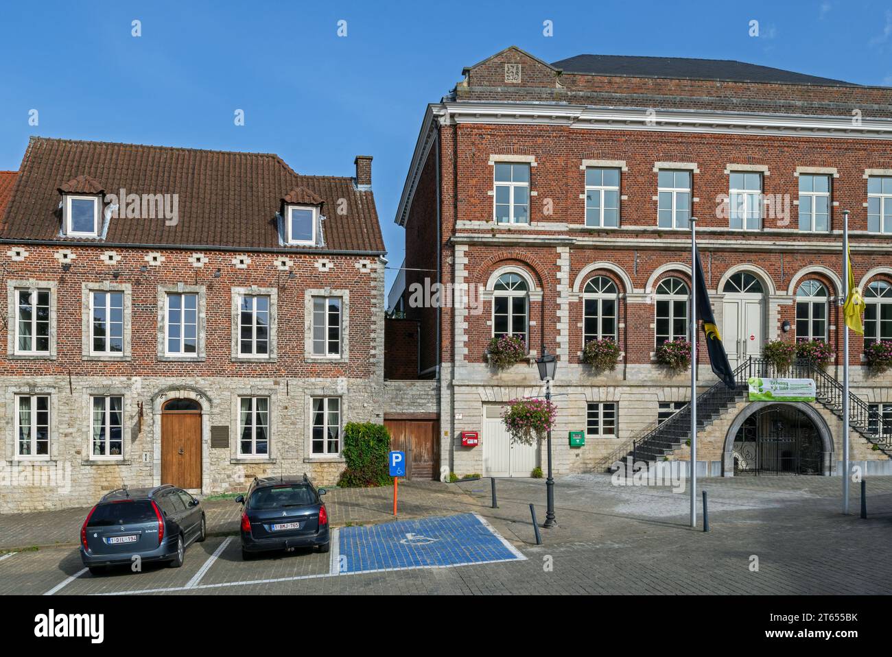 Town hall / city hall and historic house in the village Hoegaarden ...