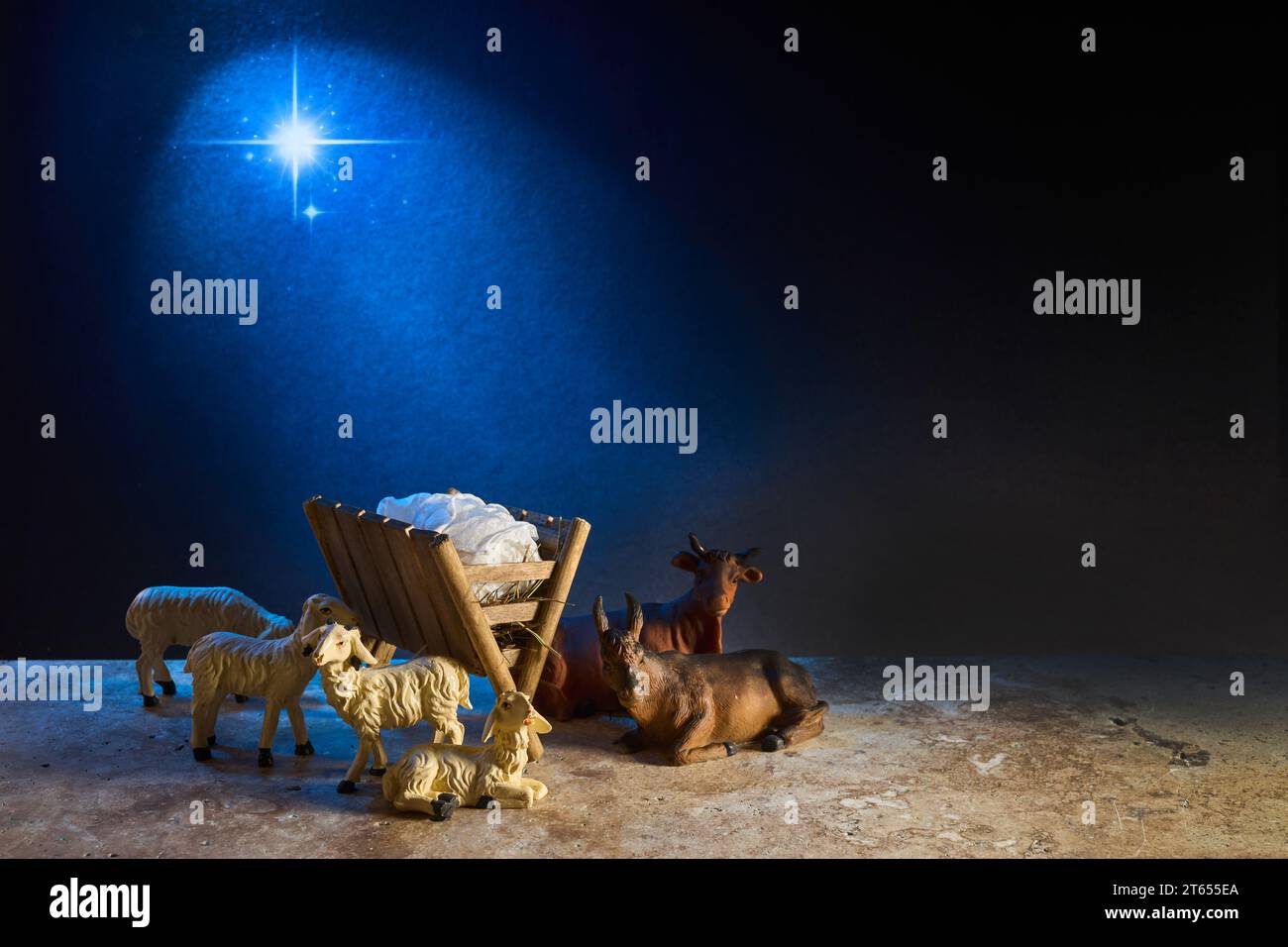 Christmas Nativity Scene of baby Jesus in the manger surrounded by the ...