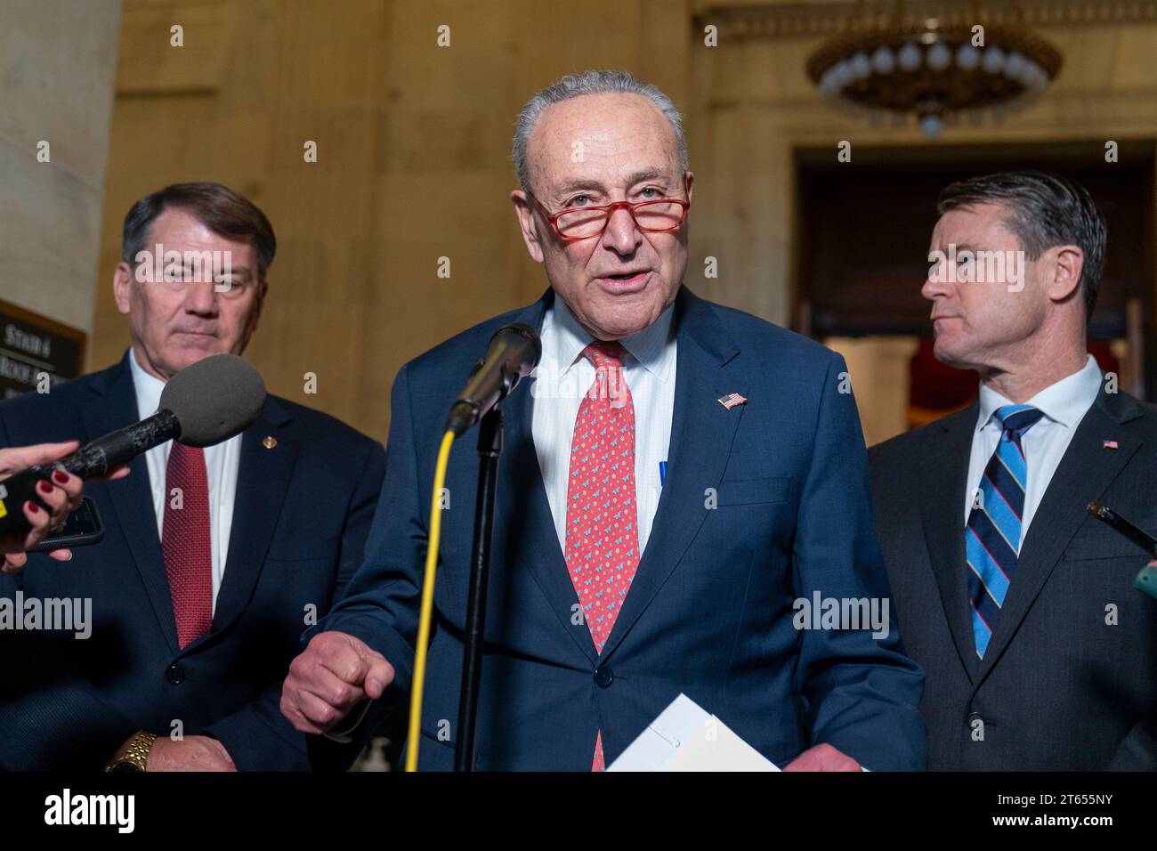 Sen. Mike Rounds, R-S.D., left, Senate Majority Leader Chuck Schumer of ...