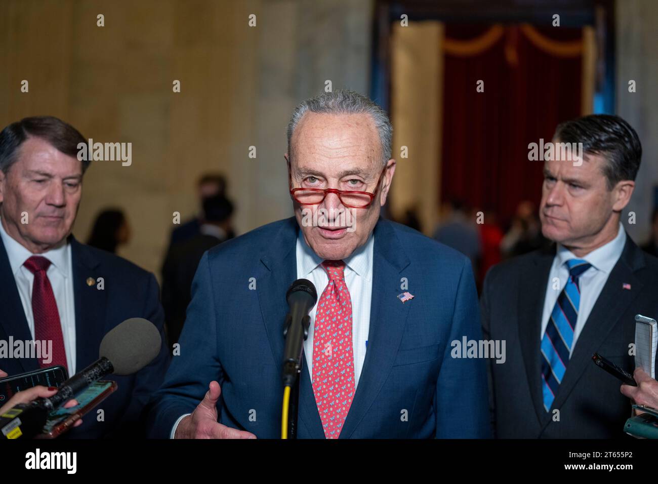 Sen. Mike Rounds, R-S.D., left, Senate Majority Leader Chuck Schumer of ...