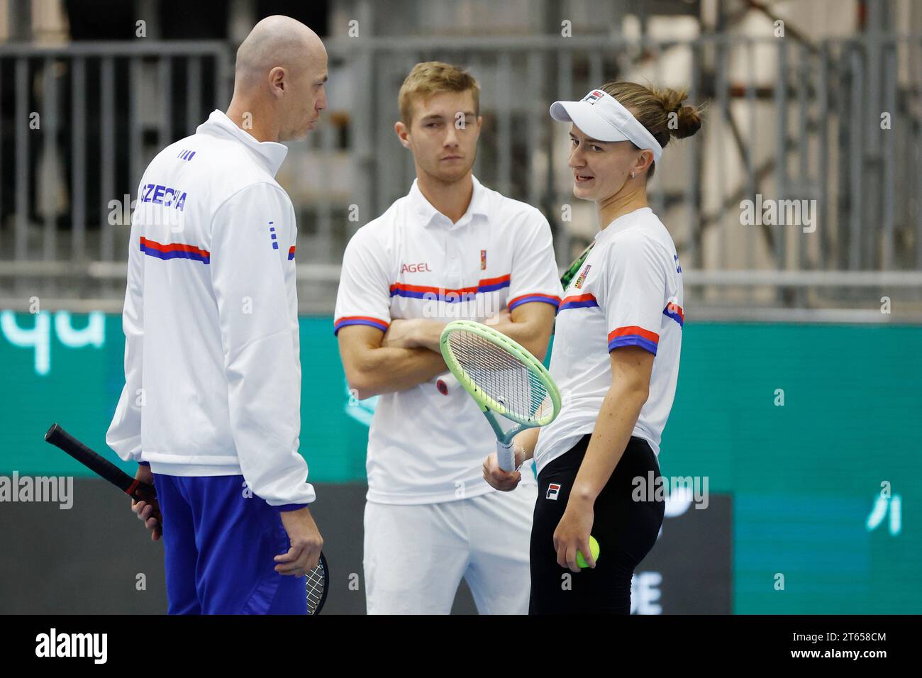 (L-R) Non-playing captain Petr Pala, coach Pavel Motl and Barbora ...