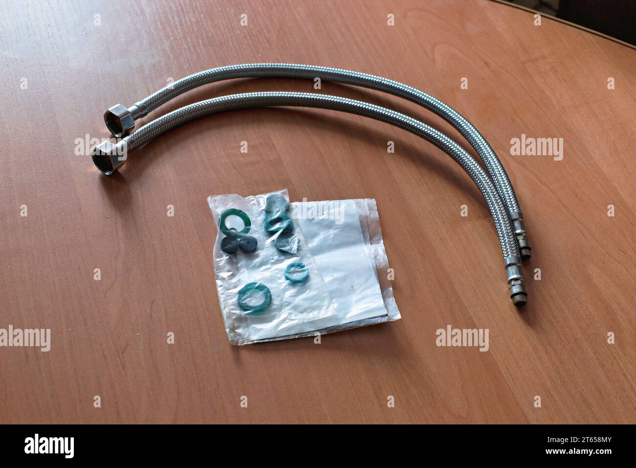 Spare parts for hot and cold water mixer Stock Photo - Alamy