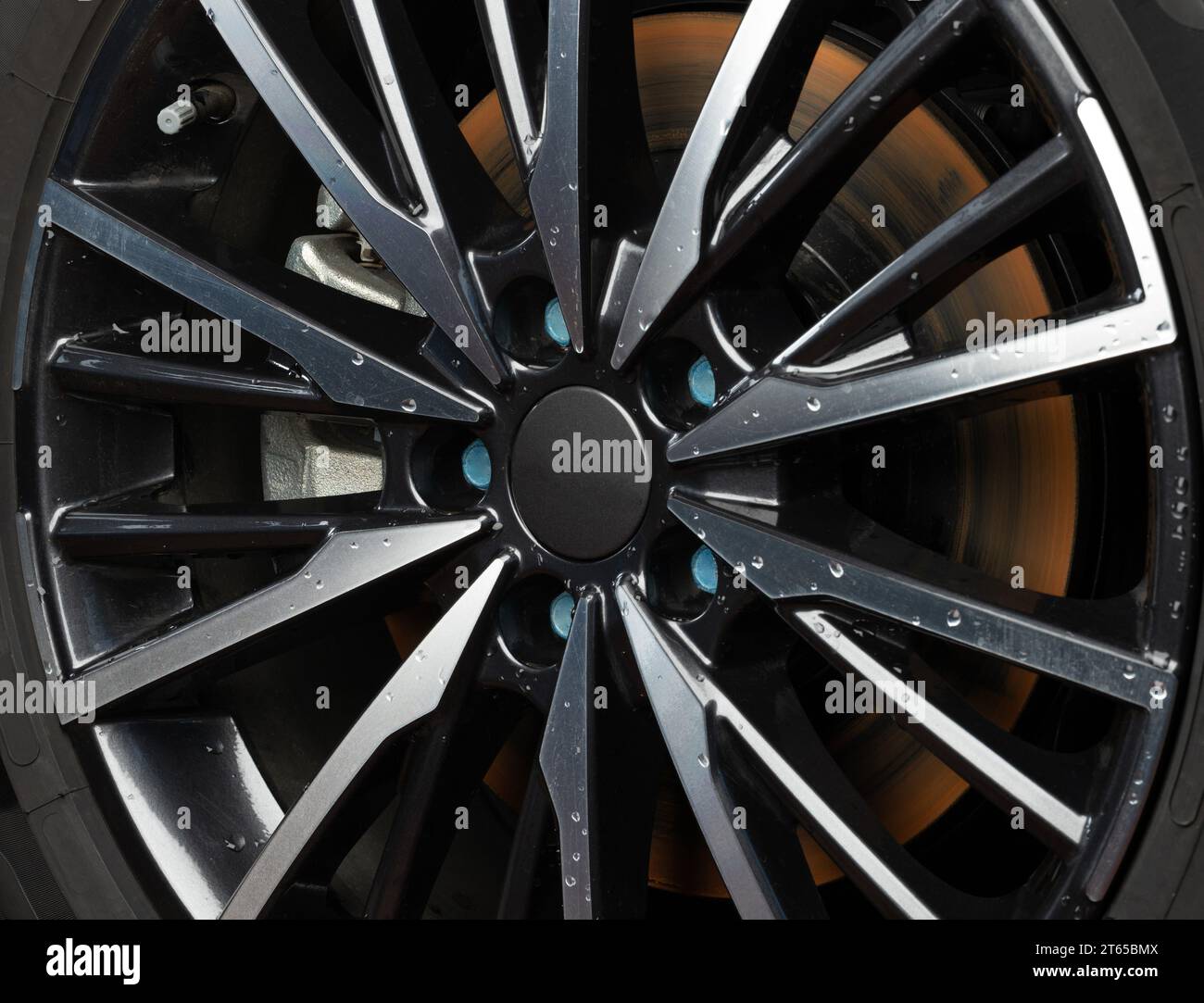 Rusty break disc on new car wheel with shiny alloy rims Stock Photo - Alamy