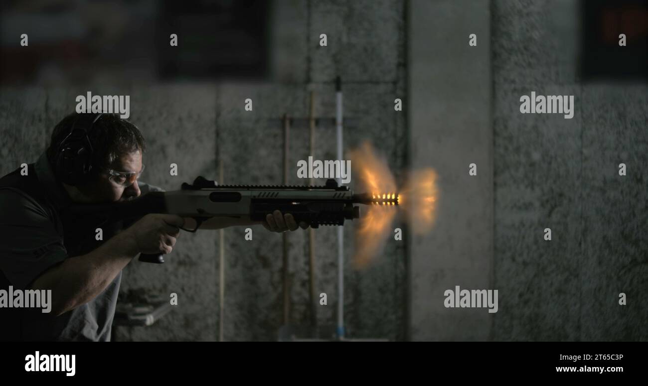 Person shooting powerful shotgun hi-res stock photography and images ...
