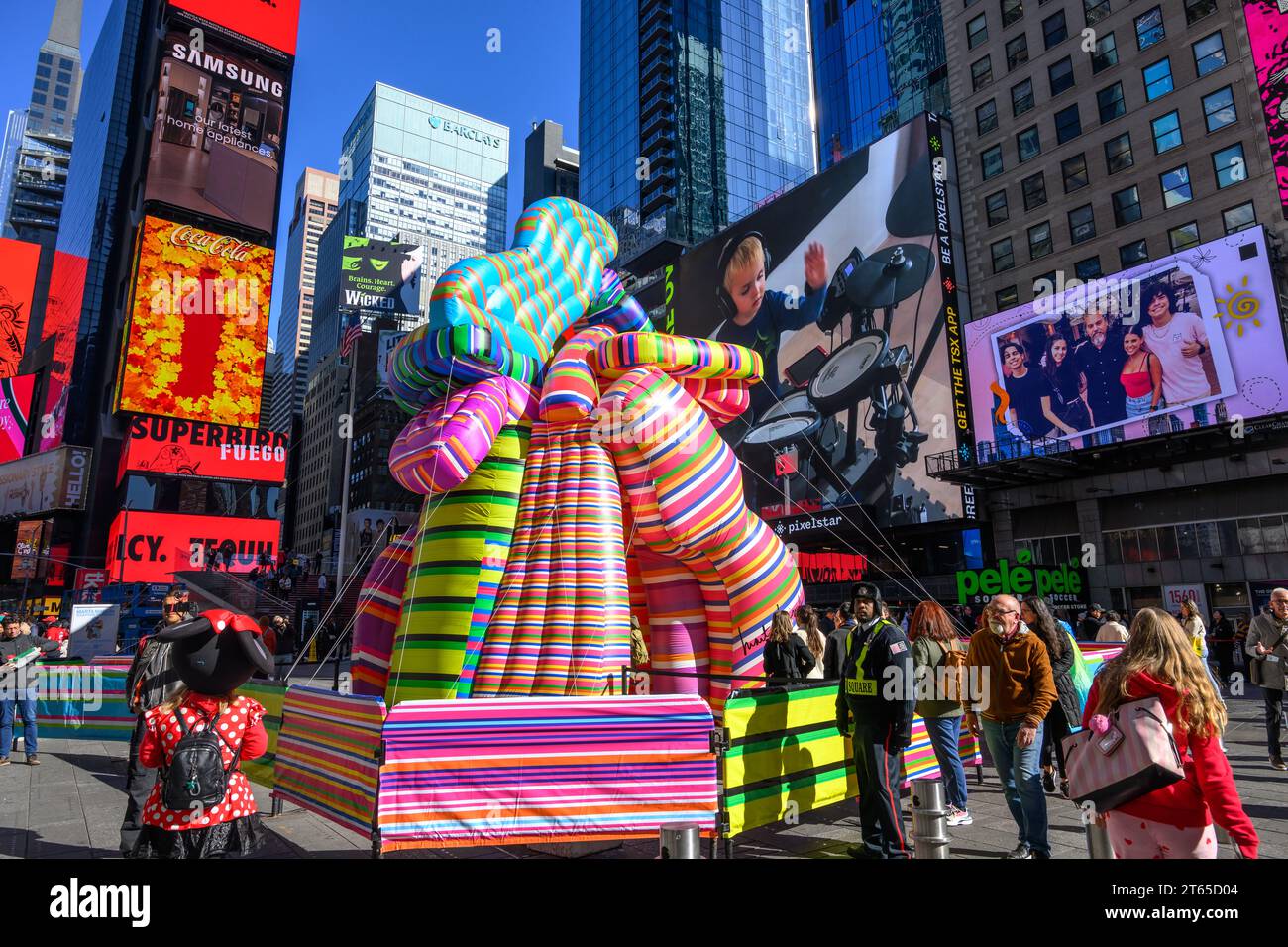 New York, USA. , . Peaple walk next to the new "Sculpture of Dreams ...