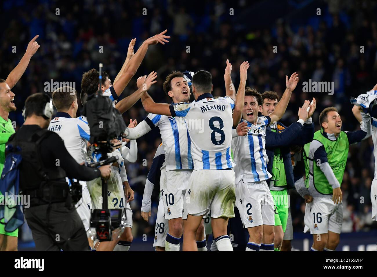 Real Sociedad players celebrate after a Group D Champions League soccer ...