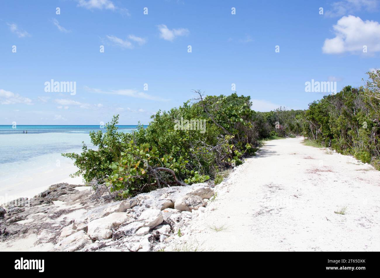 The only road stretches along the narrow beach on Little Stirrup Cay ...