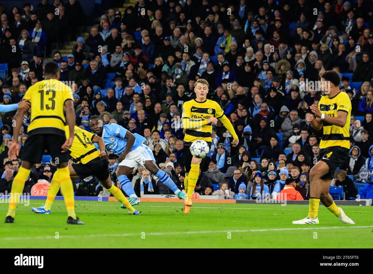 Jérémy Doku #11 of Manchester City shoots on goal during the UEFA ...