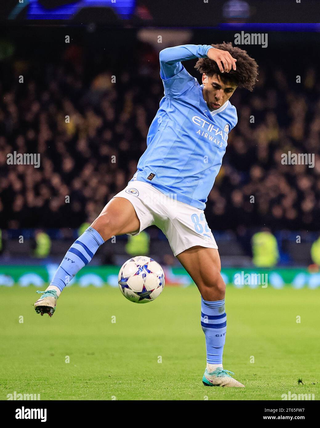 Rico Lewis #82 of Manchester City with the ball during the UEFA ...