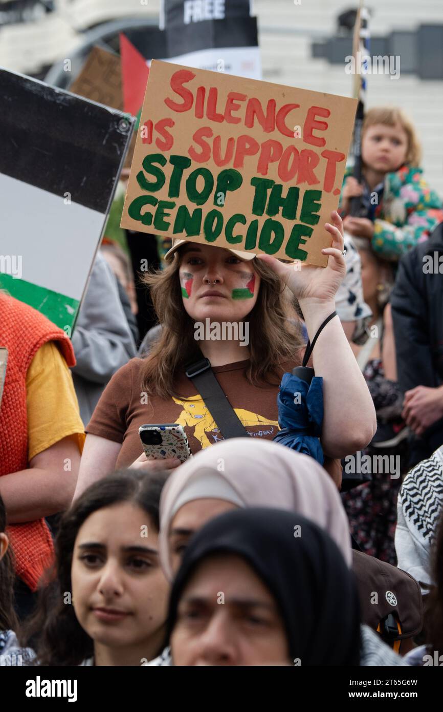 A protester holds a placard expressing her opinion during the rally ...