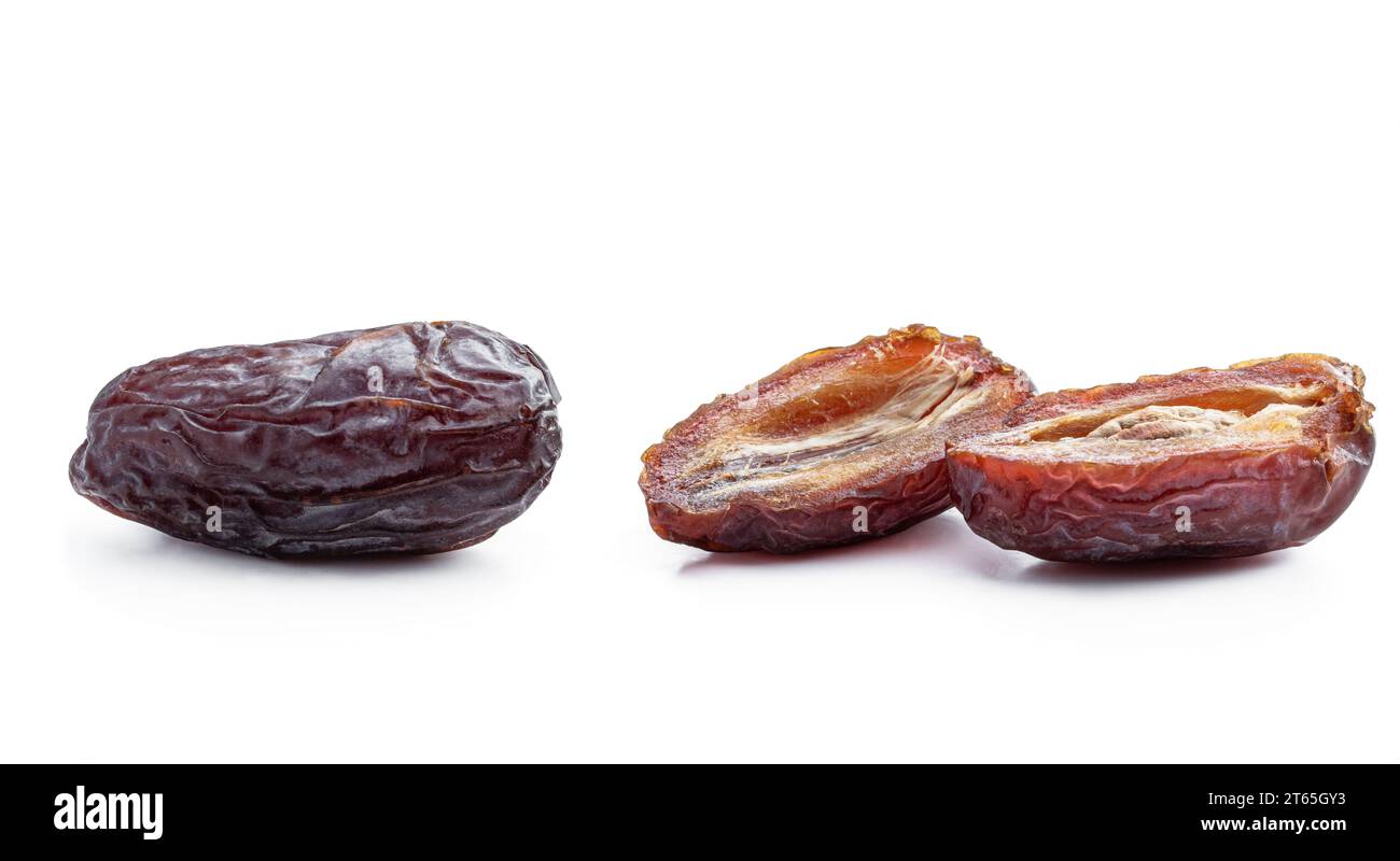 Dried dates fruits top view on white background Stock Photo - Alamy