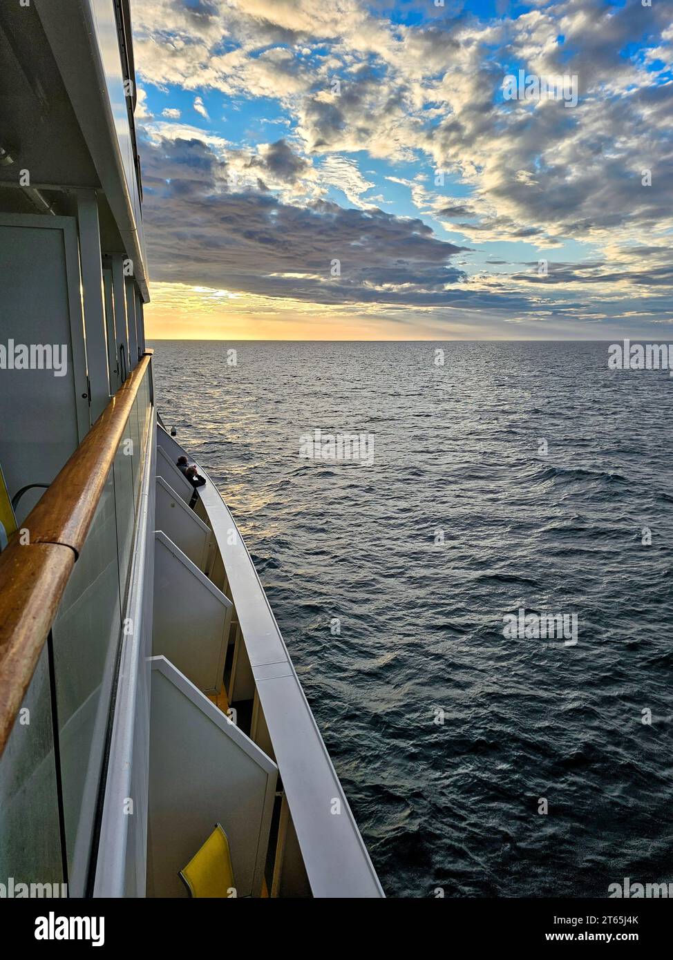 Sunset from the deck of an cruise ship in open sea Stock Photo - Alamy