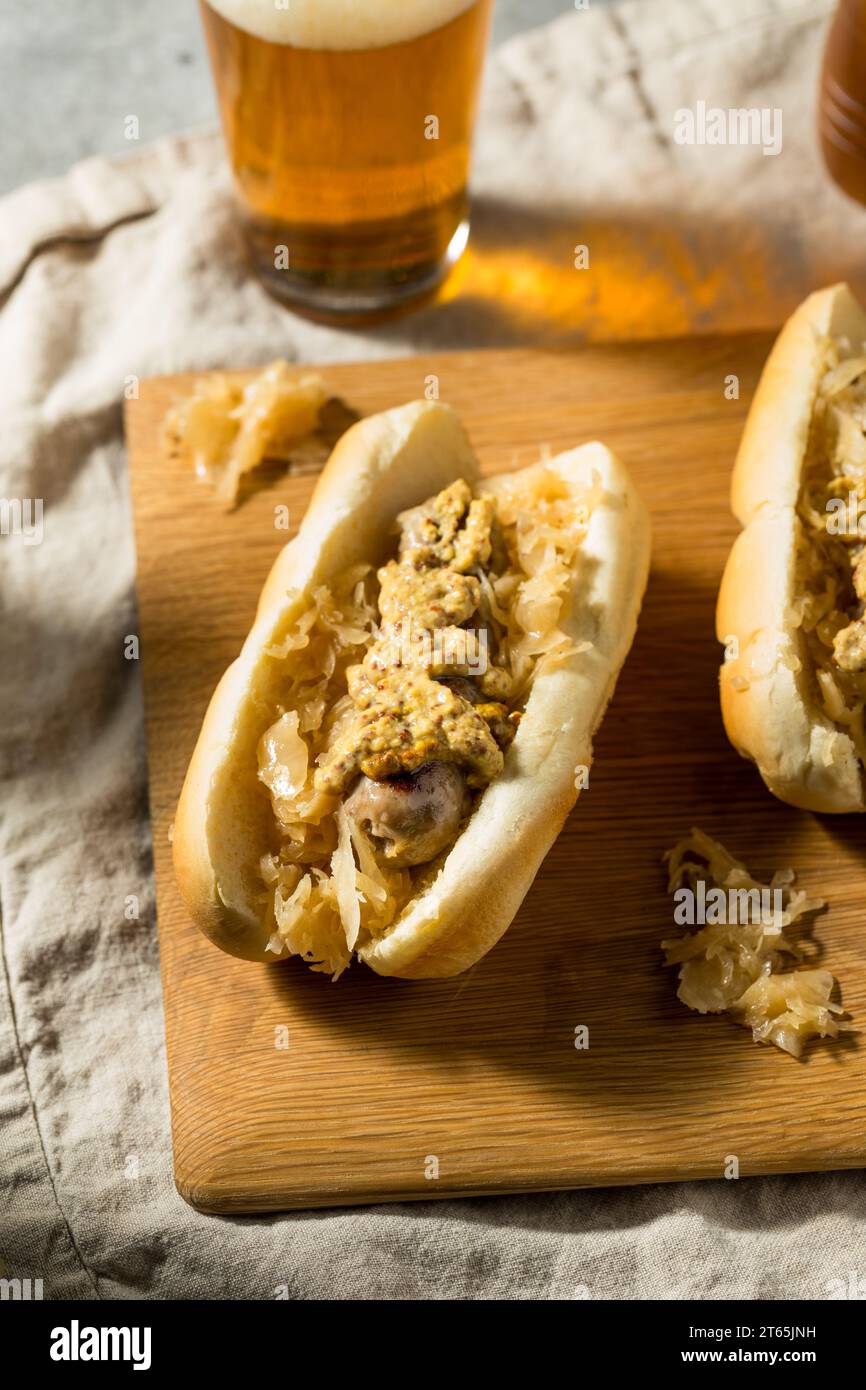 Homemade German Bratwurst Sandwich with Sauerkraut and Mustard Stock ...