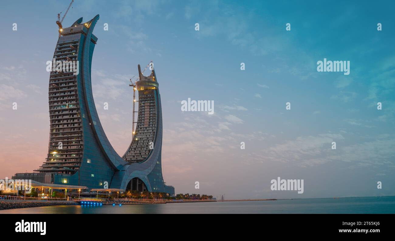 doha, qatar- july 02,2022 :lusail crescent tower under construction ...