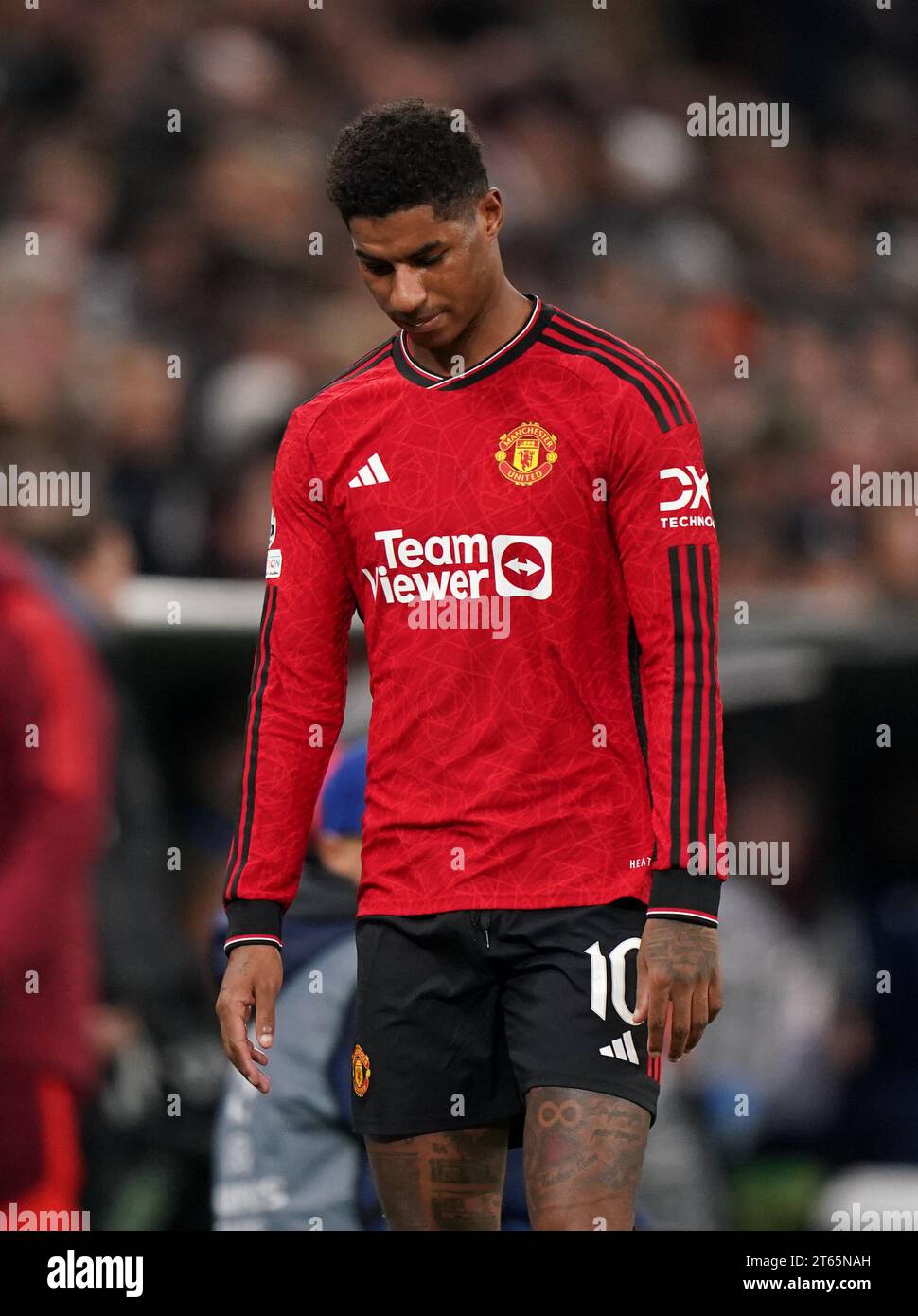 Manchester United's Marcus Rashford walks off the pitch after being ...
