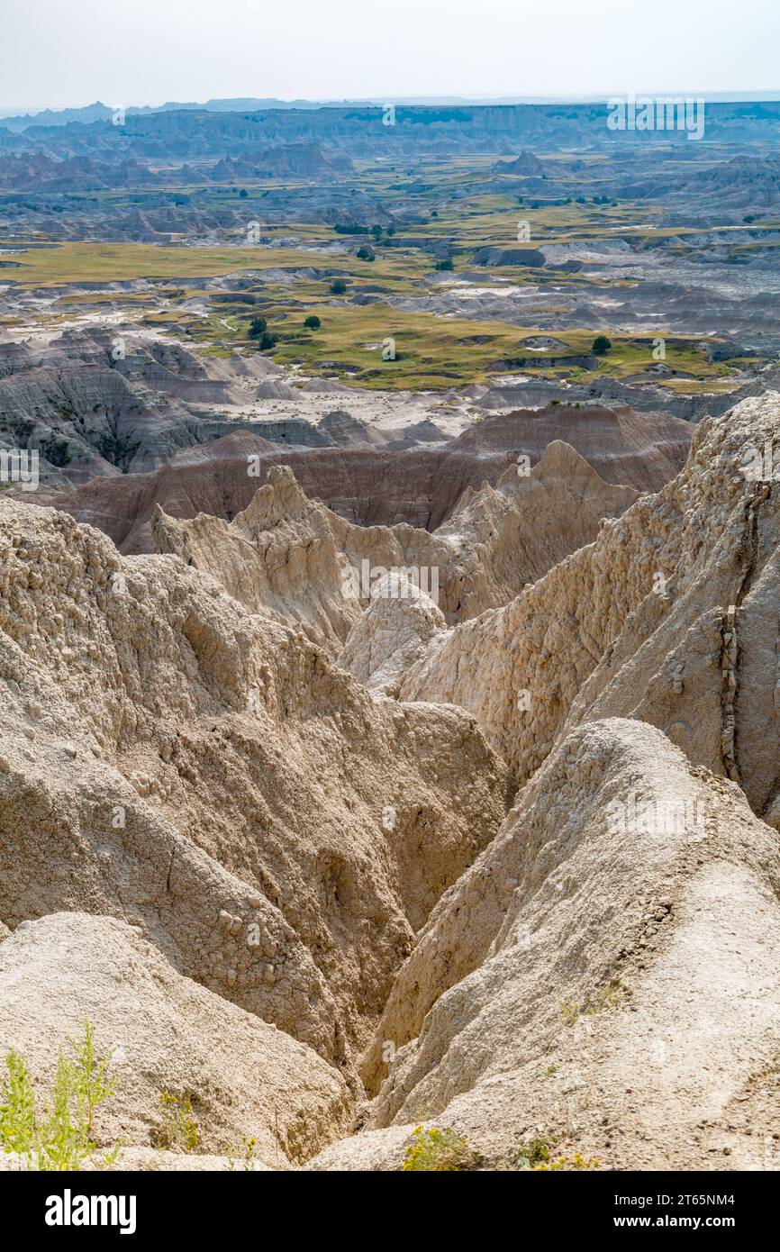Erosion exposes colorful layers of sedimentary rock in the Badlands ...