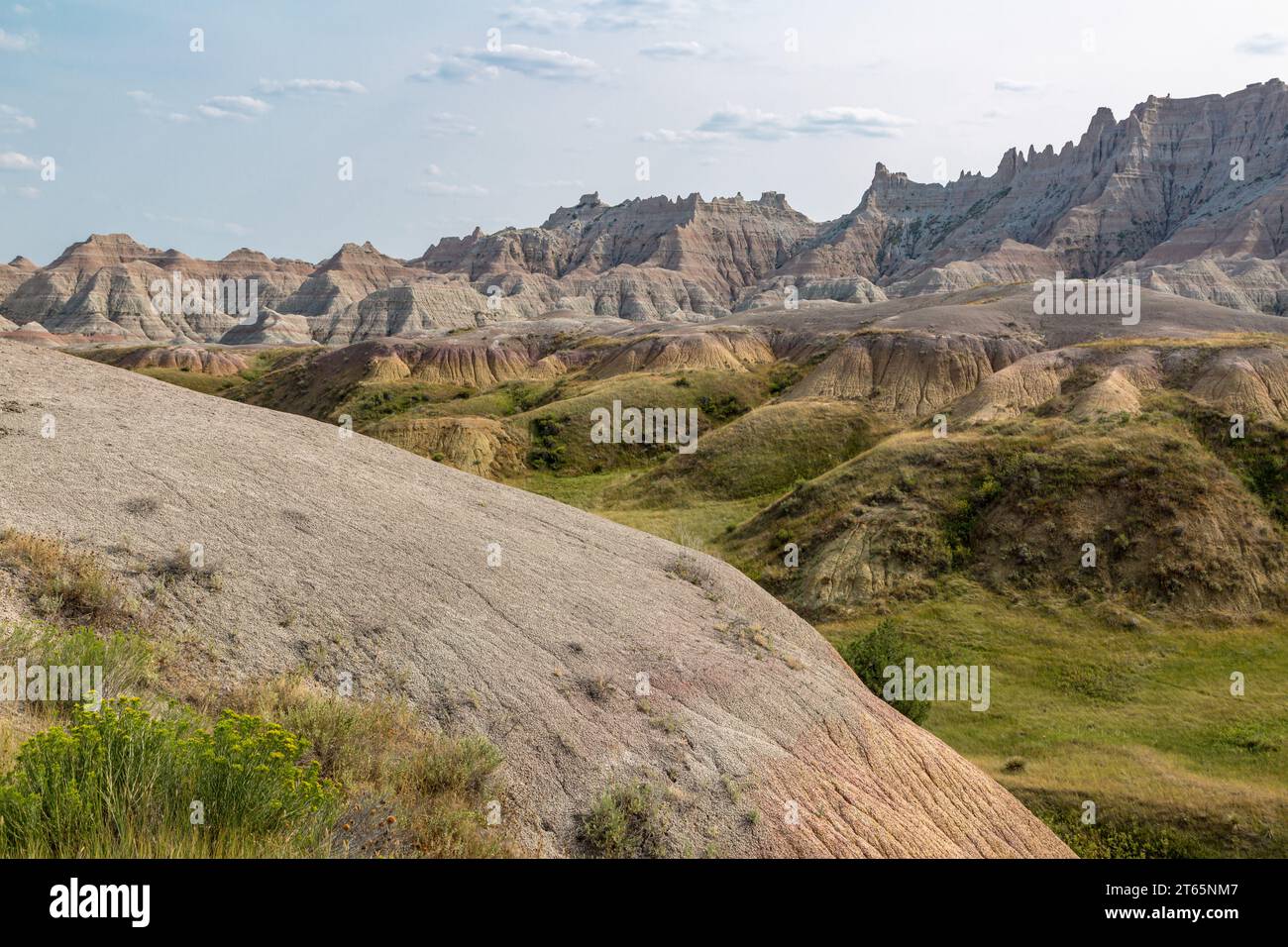 Erosion exposes colorful layers of sedimentary rock in the Badlands ...