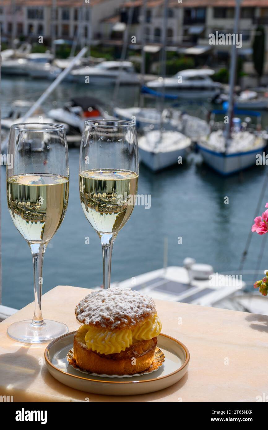 Drinking of French brut champagne sparkling wine with cake Tarte ...