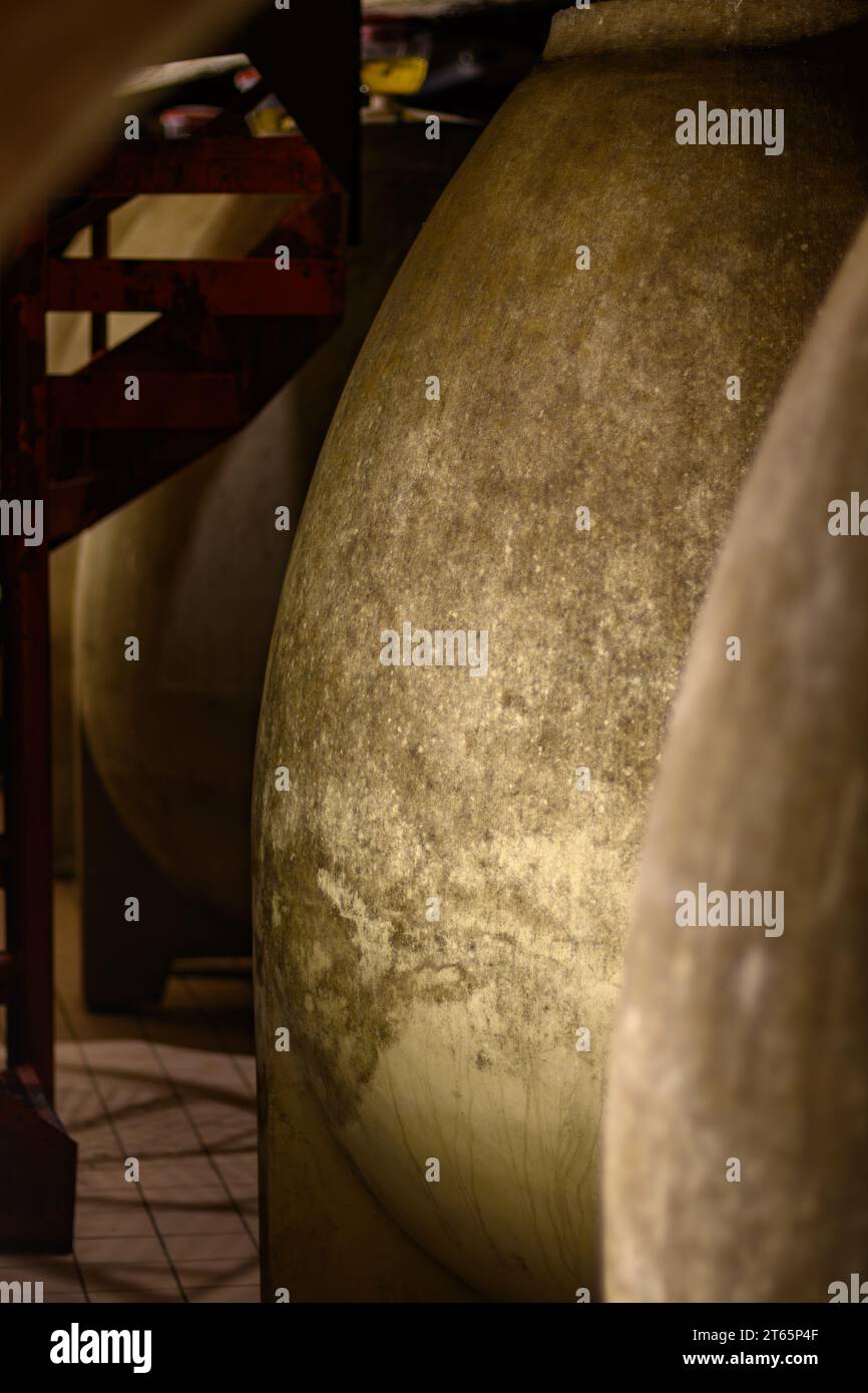 Concrete tanks eggs for fermentation process. Visit of undergrounds ...