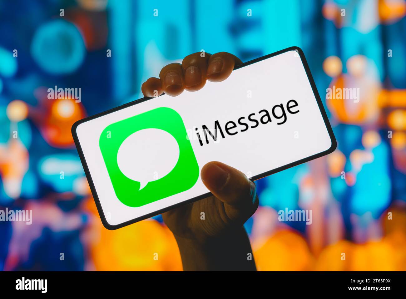 In this photo illustration, the iMessage logo is displayed on a ...