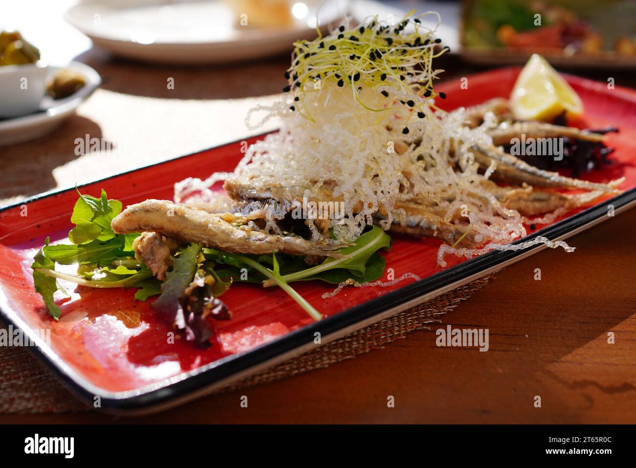 Boquerones fritos, typical Spanish tapas, Spanish fried anchovies Stock ...