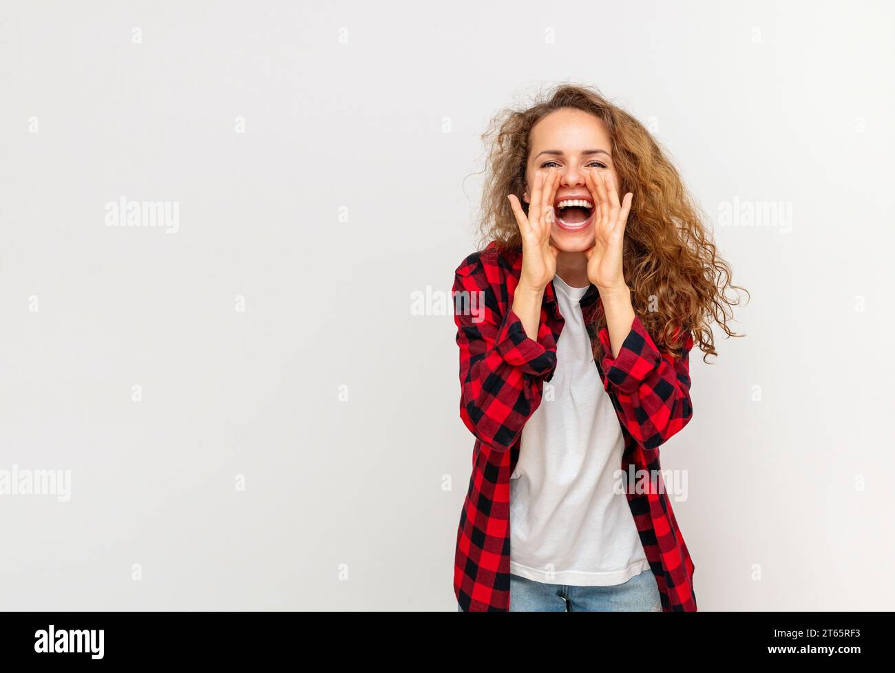 Woman cupping hands shout in hi-res stock photography and images - Alamy