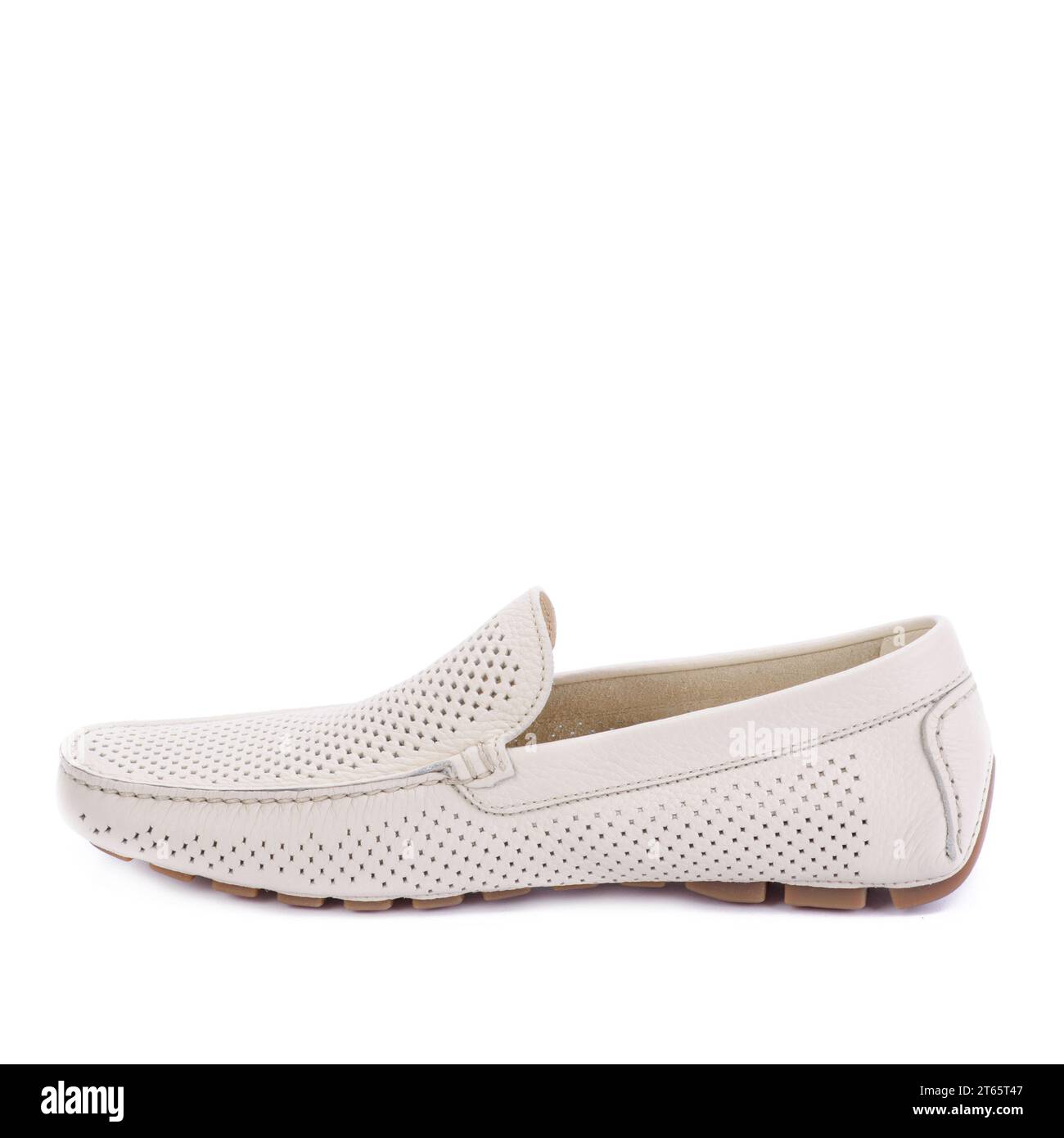 Modern ivory perforated leather men's moccasin shoe isolated on a white ...