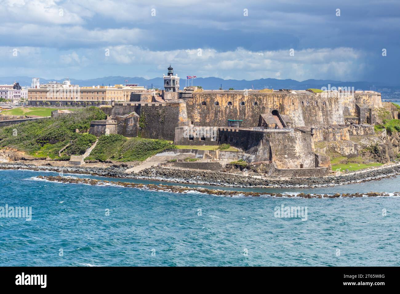 Thick walls and lighthouse of the Castillo San Felipe del Morro in San ...