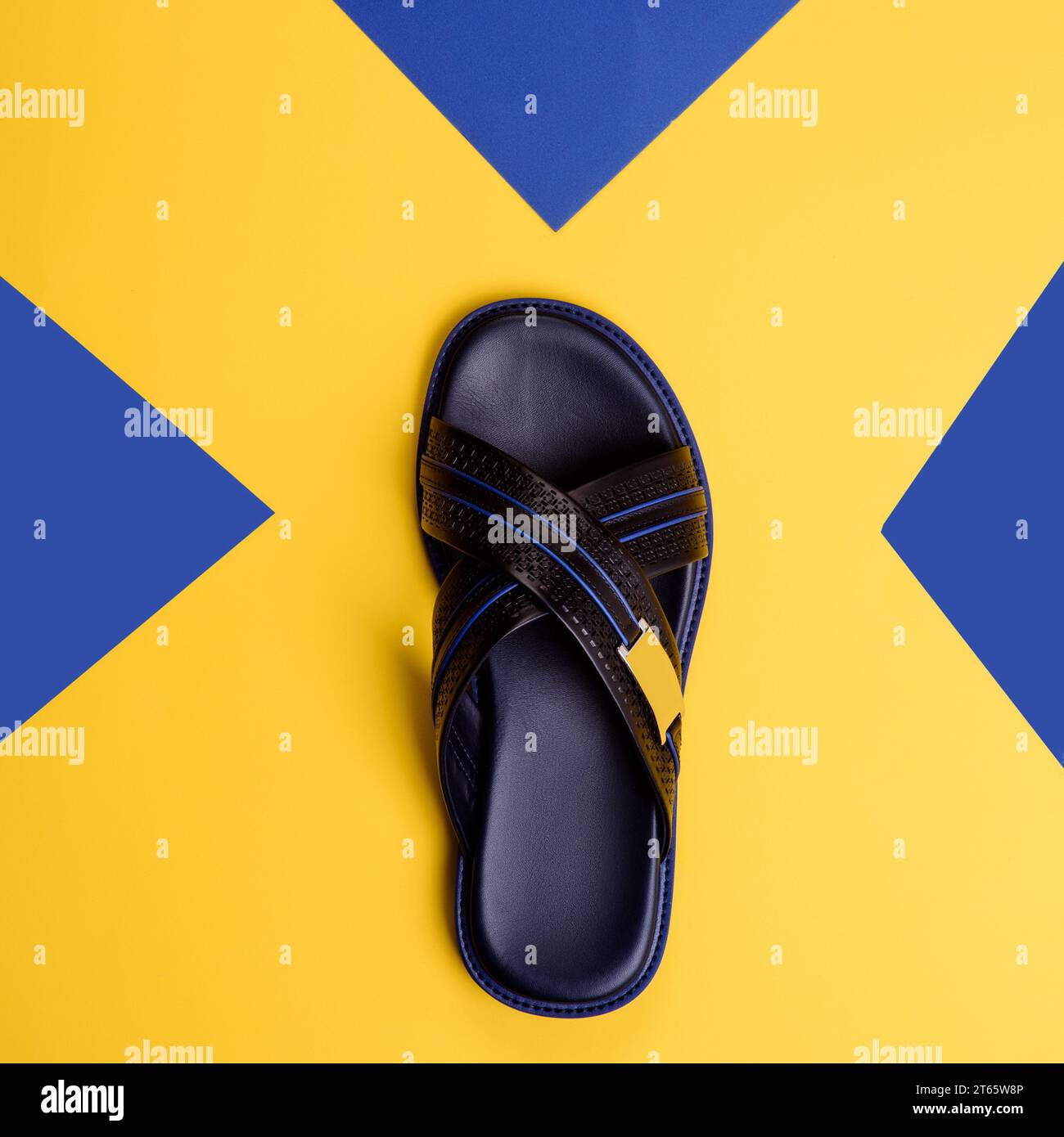 Trendy criss-cross black-blue male slipper with embossing design ...