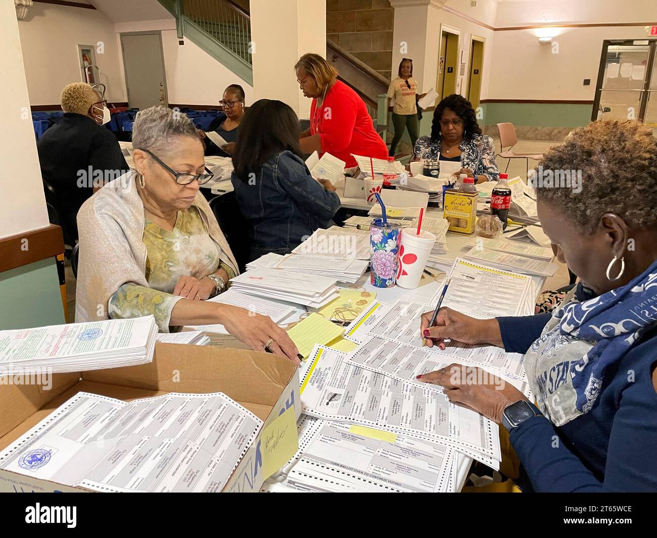 An election resolution board counts absentee ballots Wednesday, Nov. 8 ...
