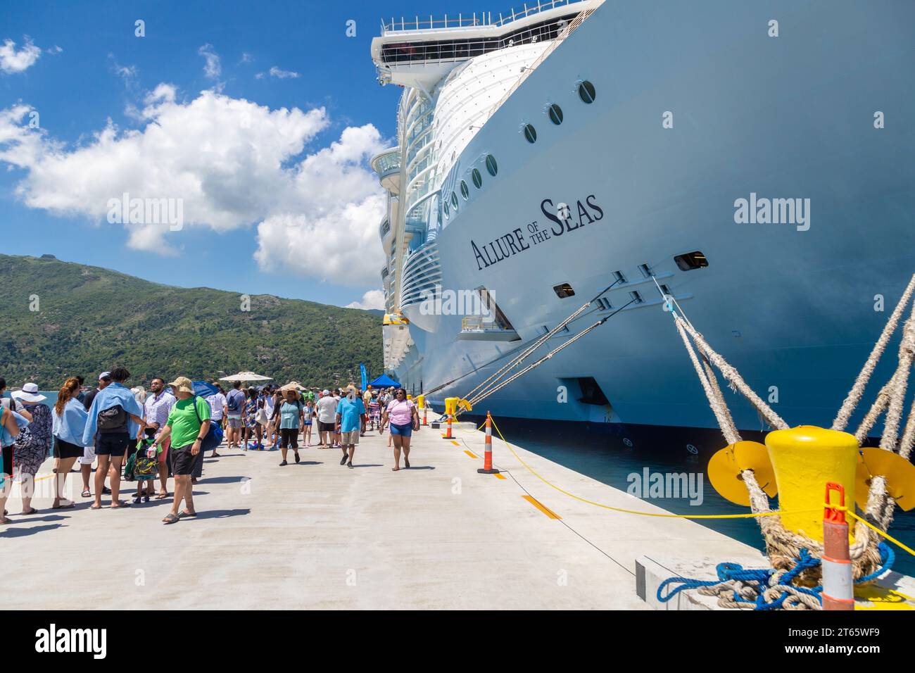 Cruise passengers disembark from the Royal Caribbean Allure of the Seas ...