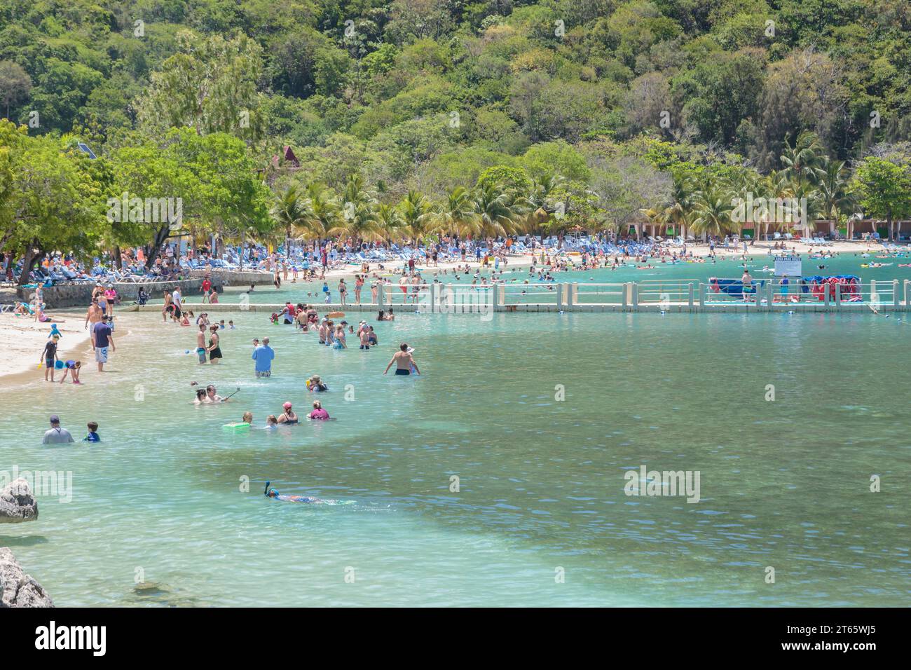 Cruise passengers playing at the beach on Royal Caribbean's private ...