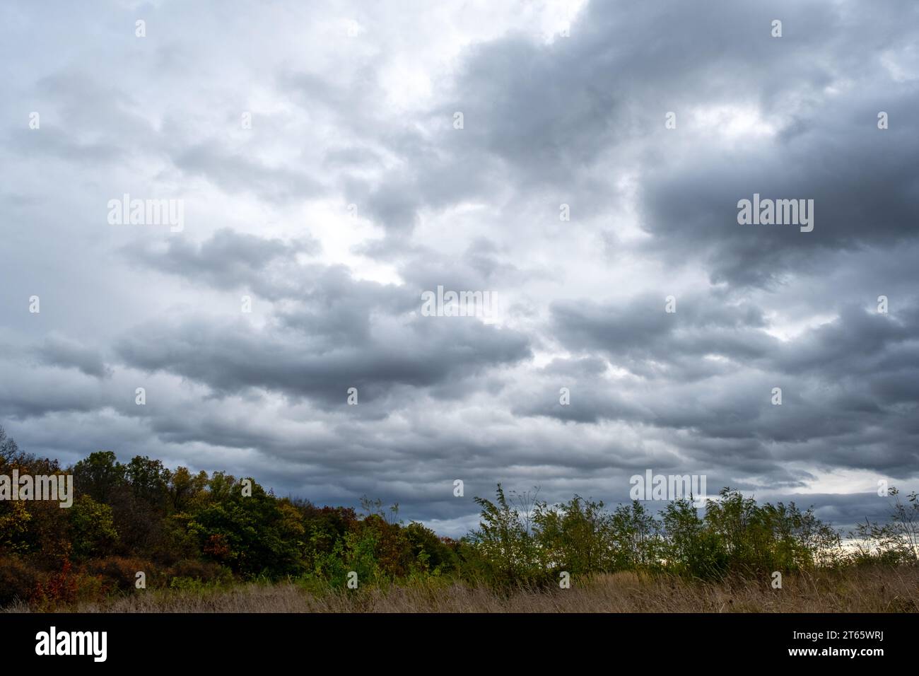 heavy clouds over the landscape, rainy clouds, dramatic sky scenery ...