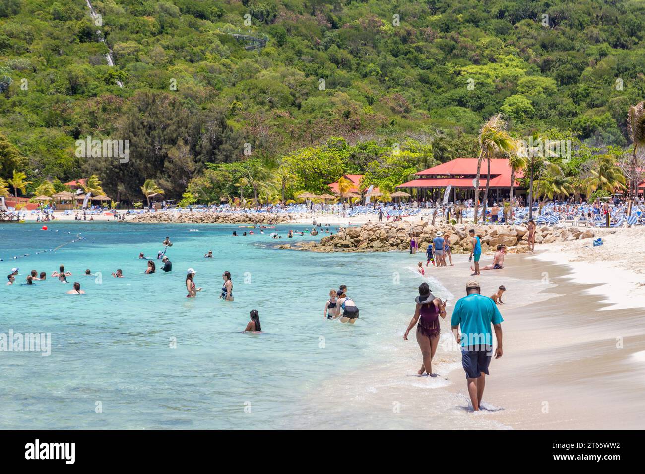 Cruise passengers at the beach on Royal Caribbean's private coastal ...