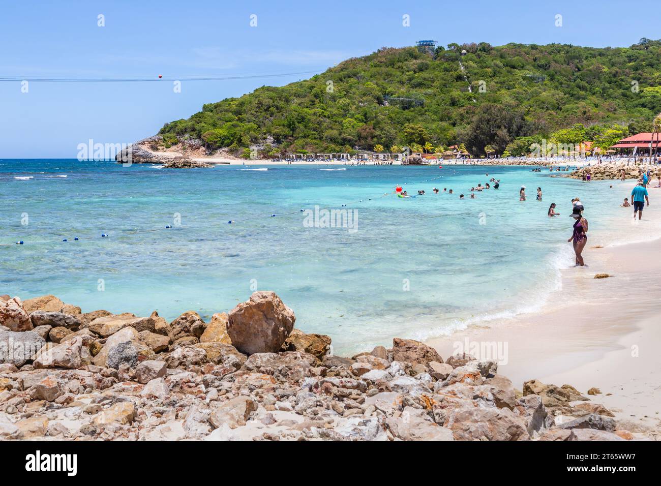 Cruise passengers at the beach on Royal Caribbean's private coastal ...