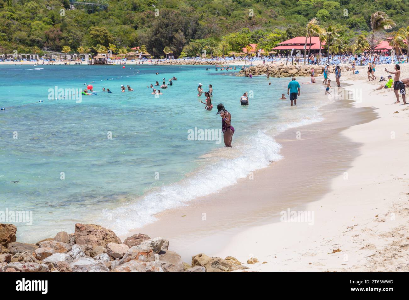 Cruise passengers at the beach on Royal Caribbean's private coastal ...