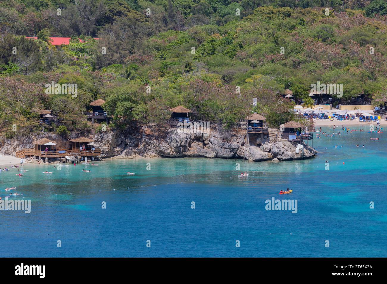 Private cabanas on the rocky shoreline of Royal Caribbean's private ...